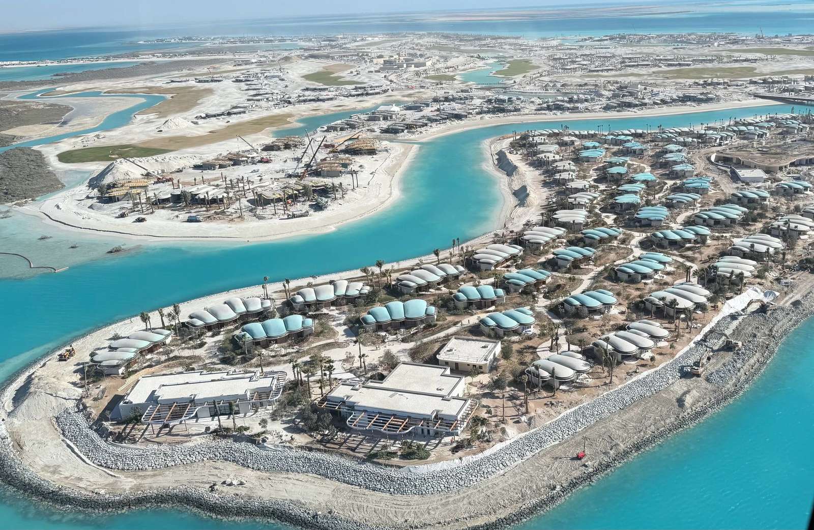 Photos showing the progress of construction work on Shura Island