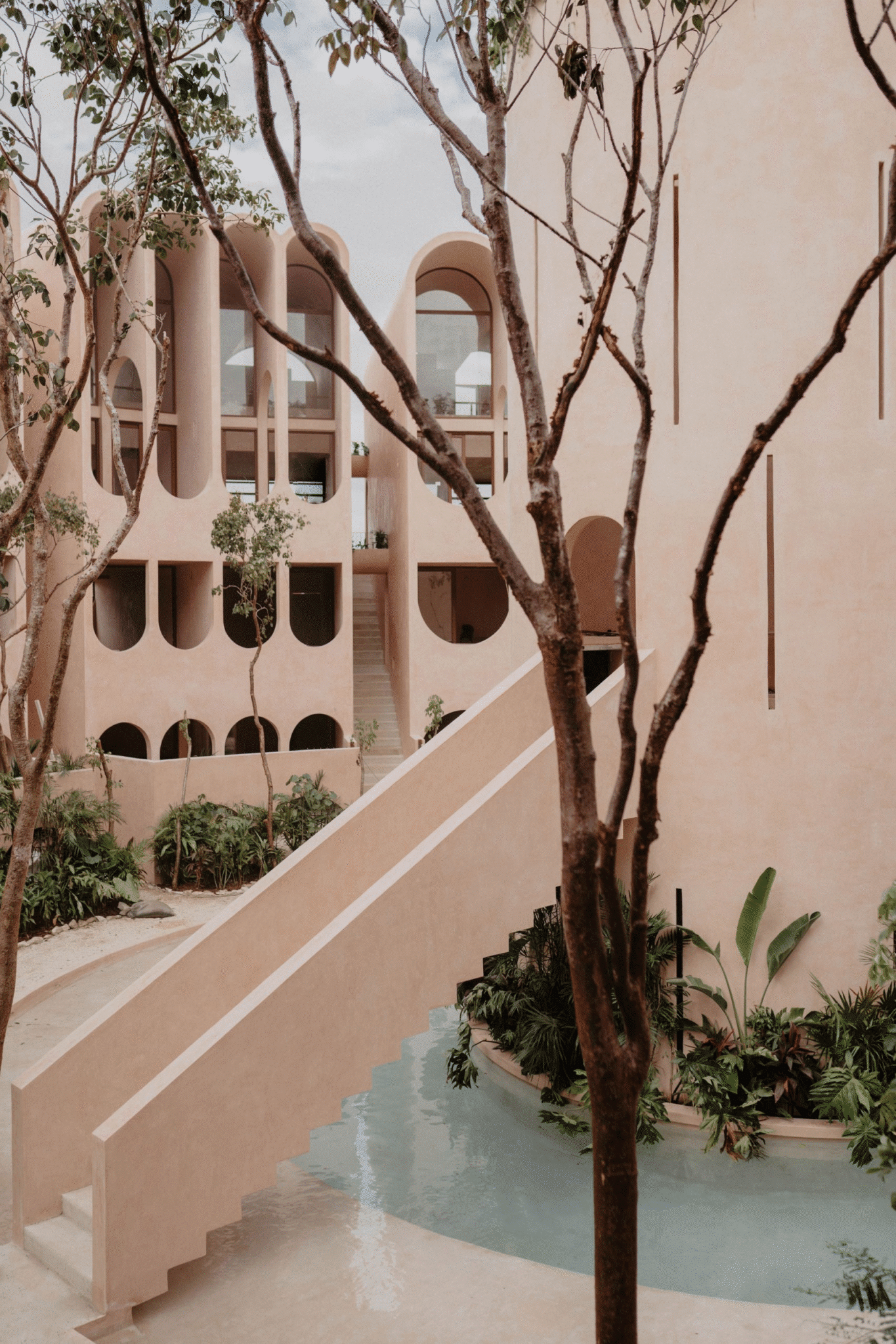 Babel Housing: V Taller Completes Pink Stucco Residential Complex in ...